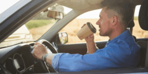 Eating, Drinking or Smoking While Driving: Is It Illegal?- Cars24 Australia